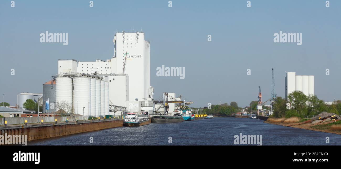 Oldenburg inland port on the hunte with ships and silos hi-res stock ...
