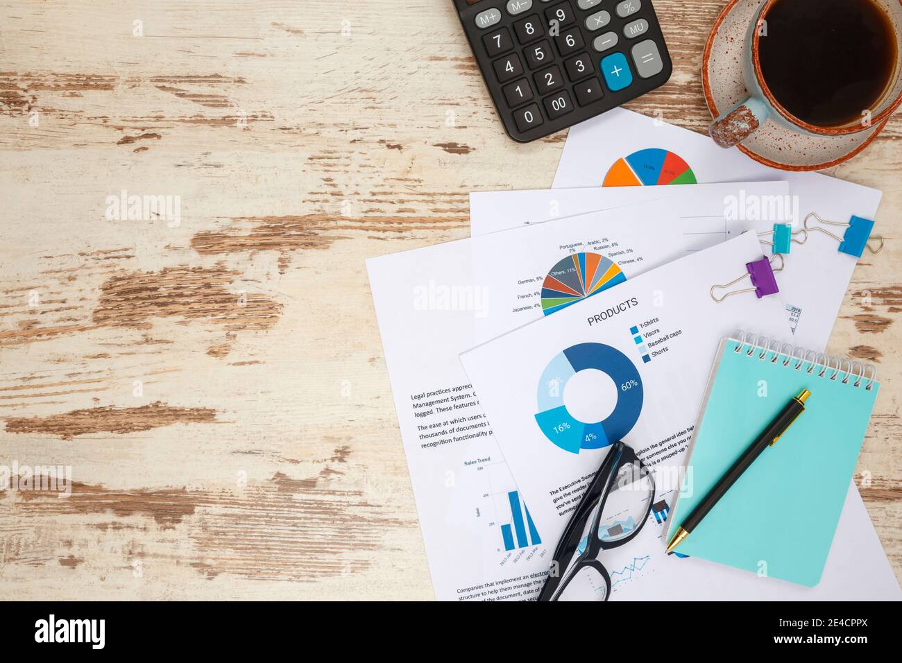 Business accounter working with documents and calculator on office desk ...