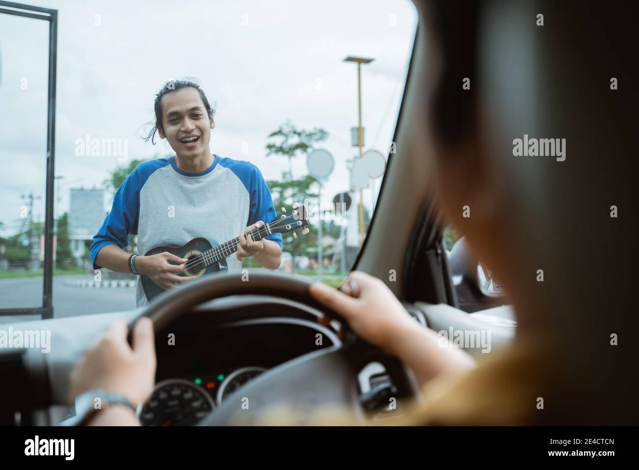 Musical beggar hi-res stock photography and images - Alamy