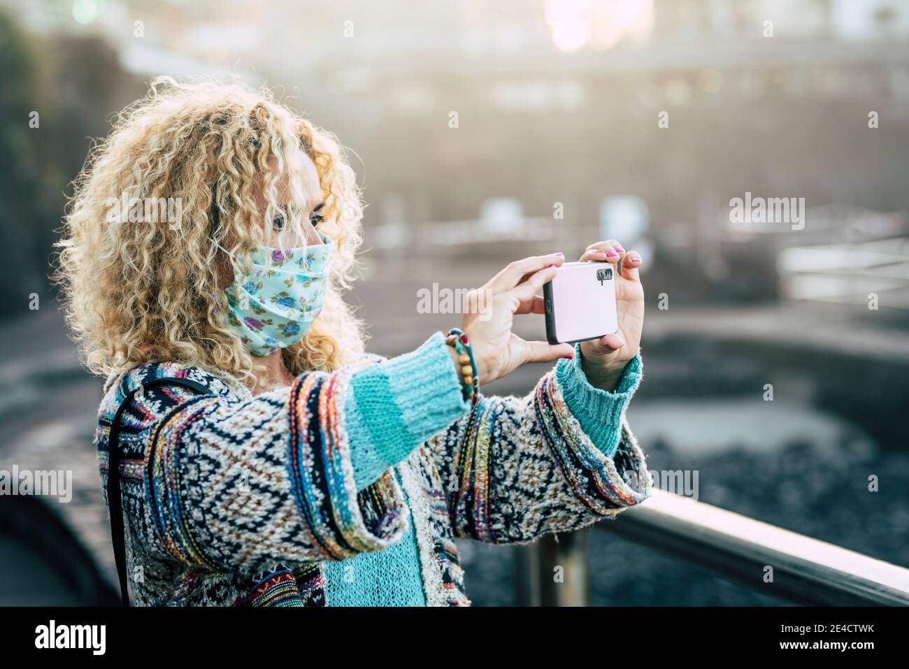 Beautiful woman wear outdoor facial coronavirus protection mask ...