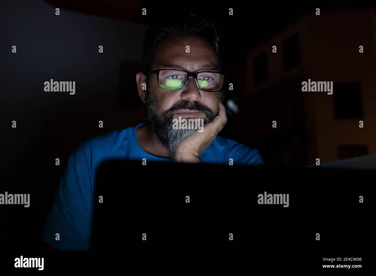 Man dark laptop display hi-res stock photography and images - Alamy