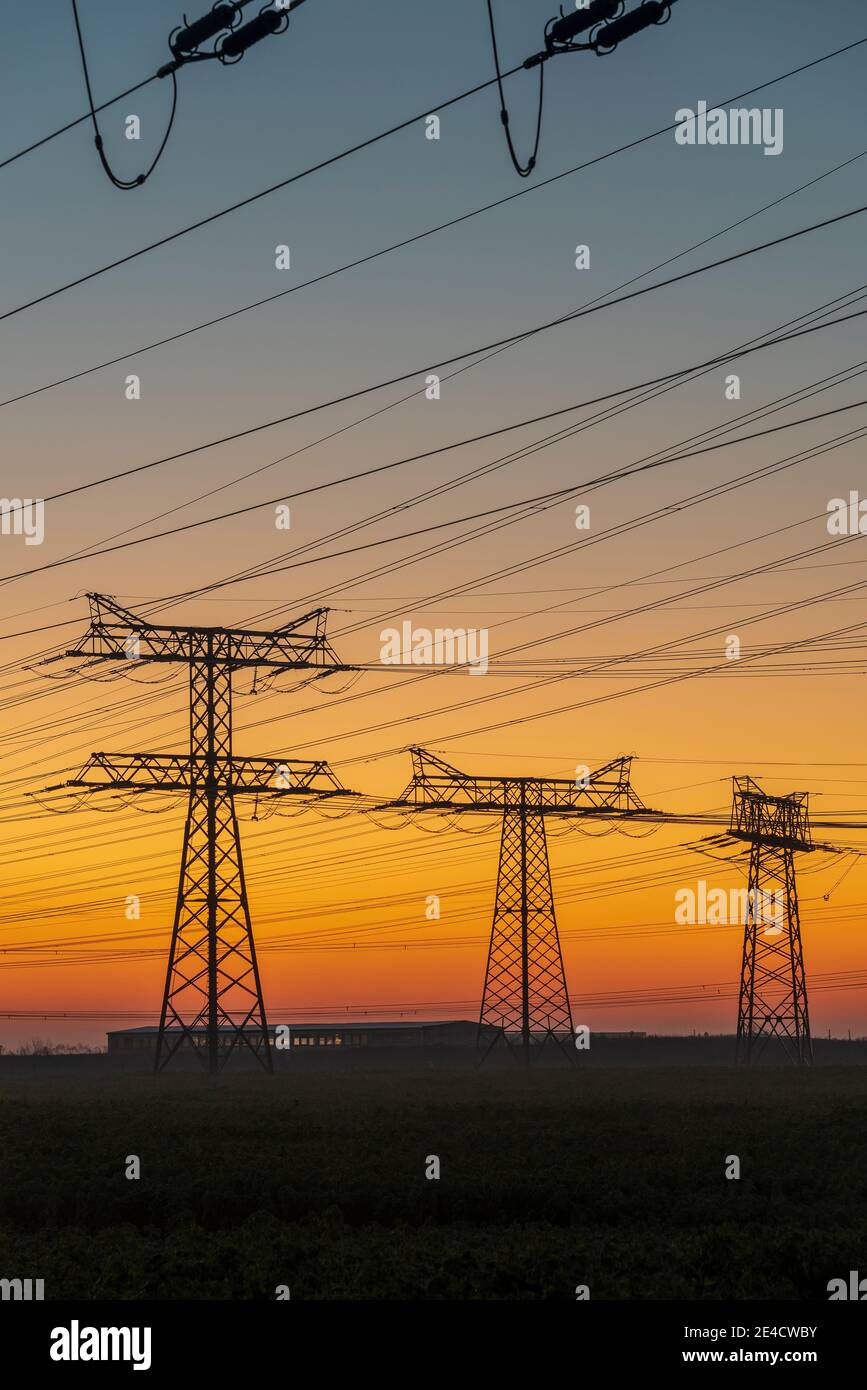 Power pylons, electricity pylons, power lines Stock Photo - Alamy