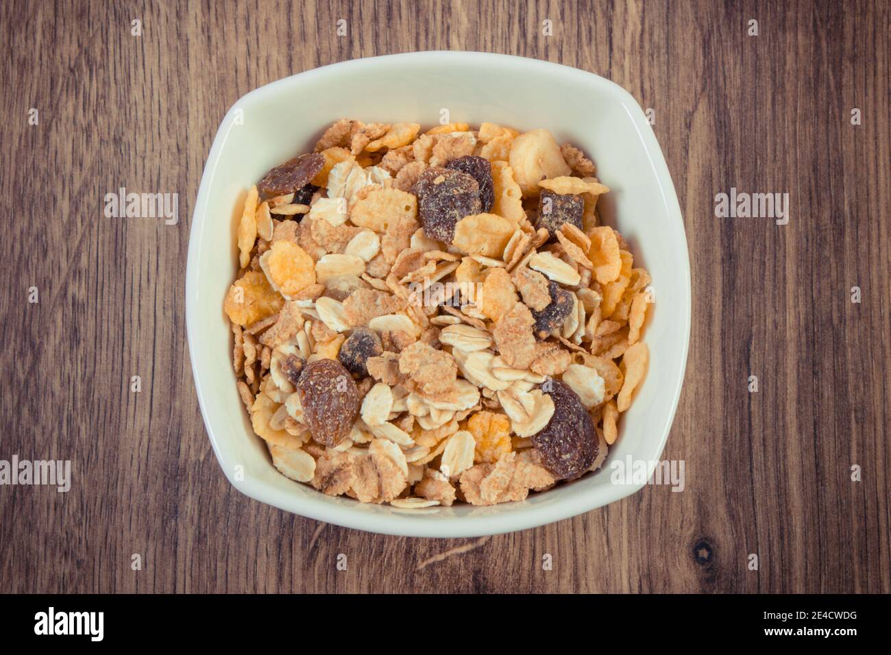 Portion of muesli in glass bowl. Healthy nutrition as source vitamins ...