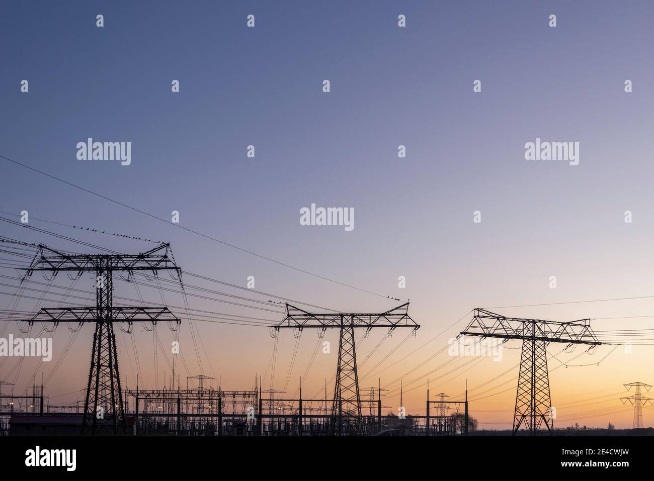 Sunrise, heavy current pylons, power pylons, power lines, Wolmirstedt ...