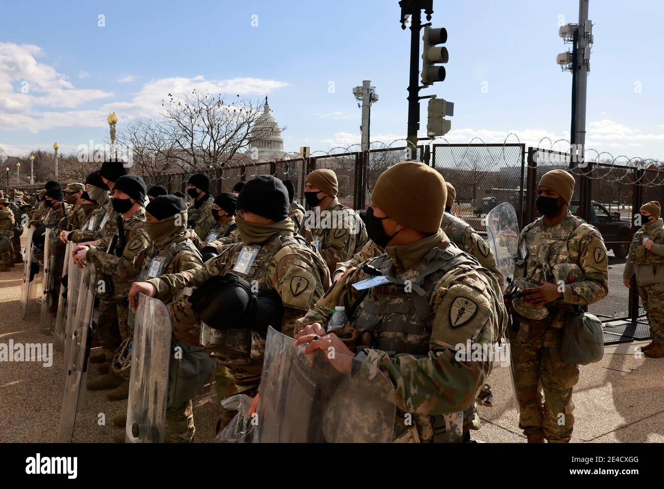 National Guard troops stand in formation at the United States Capitol ...