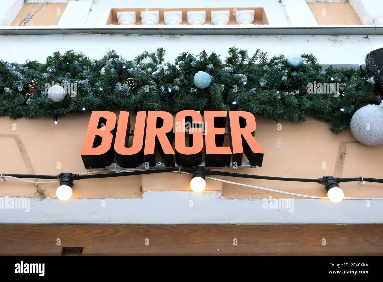 View of burger signboard on building wall Stock Photo - Alamy