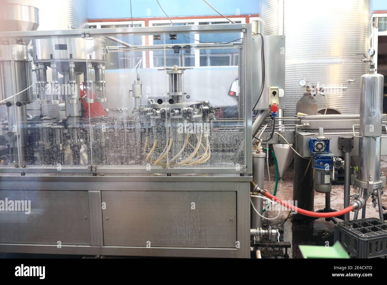 View of wine bottling line in winery Stock Photo - Alamy
