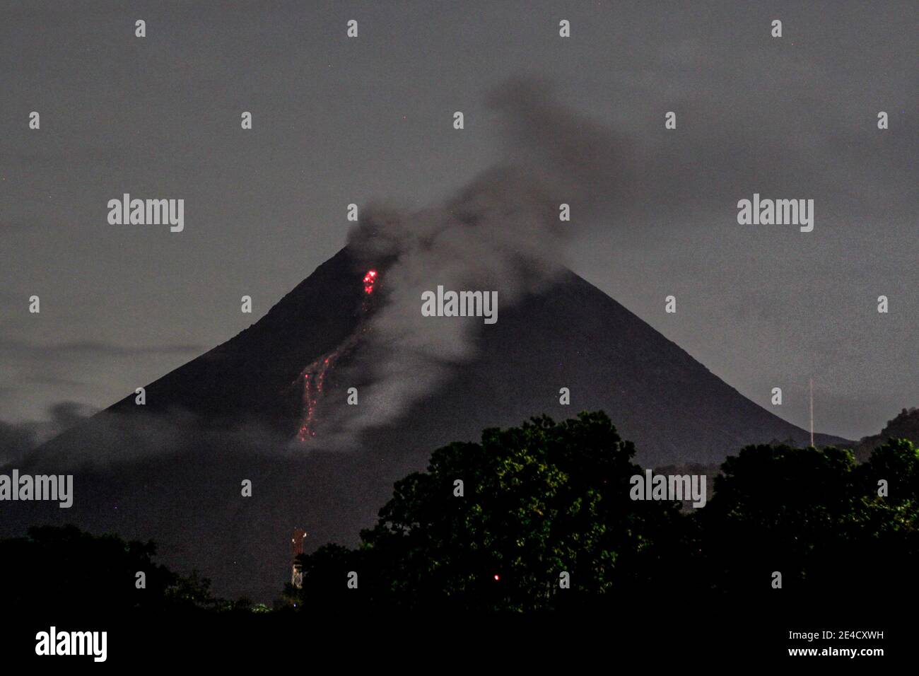 Sleman, YOGYAKARTA, INDONESIA. 21st Jan, 2021. Lava and hot clouds flow ...