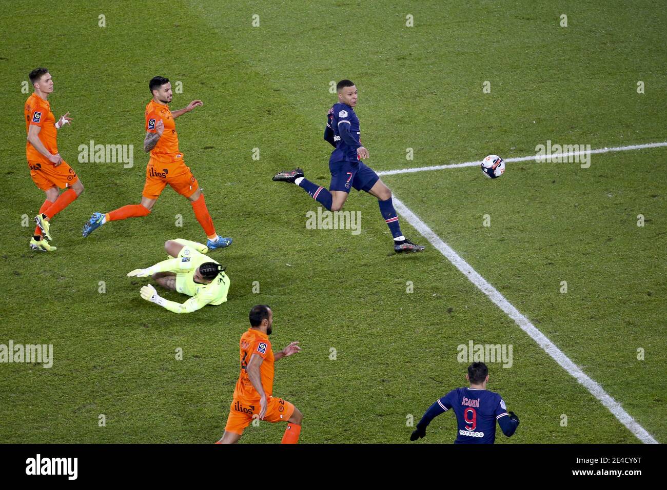 Kylian Mbappe of PSG scores his first goal, passing by goalkeeper of ...