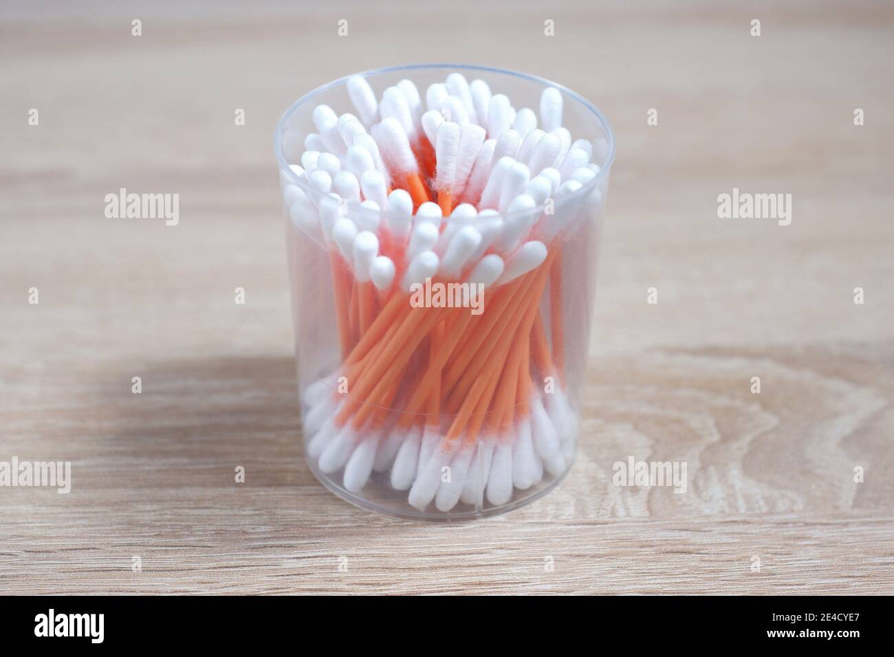 Cotton swabs in a container on the table Stock Photo - Alamy