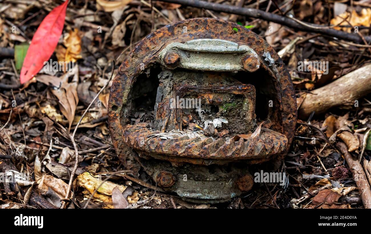 Old discarded and rusted differential housing car part left to rot in ...