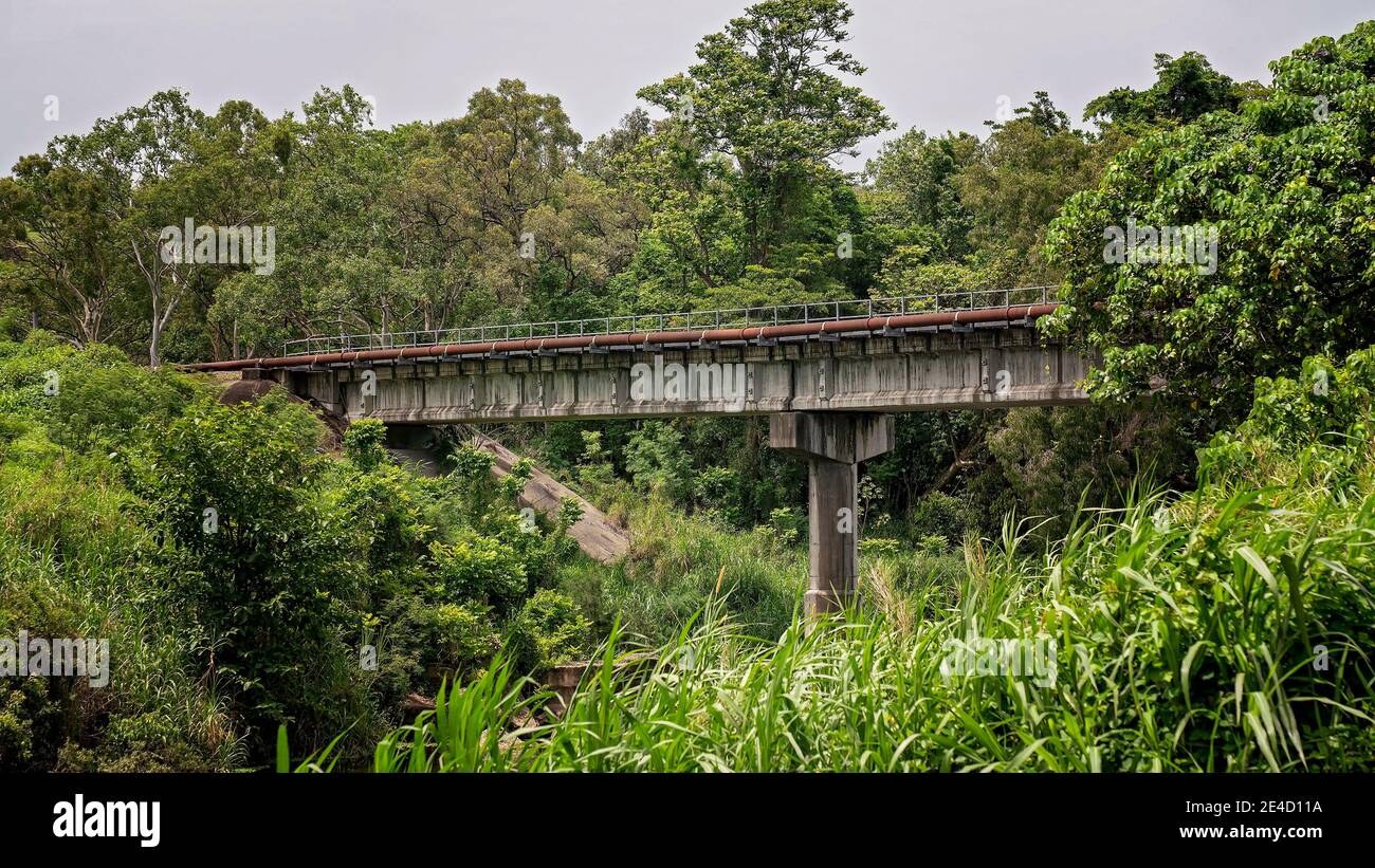 Concrete constructed bridge for highway traffic across a rural creek ...