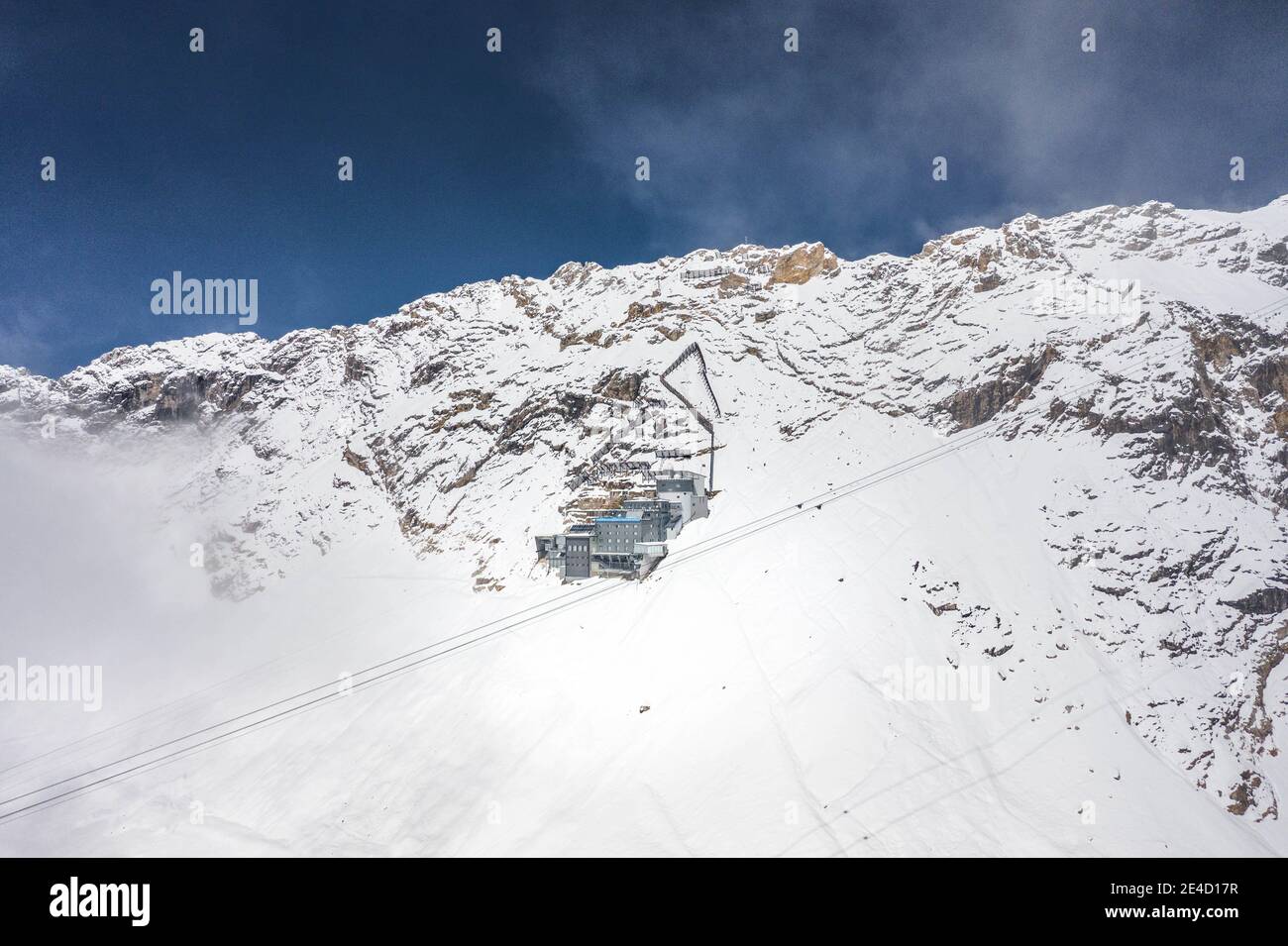 Person top of mountain aerial hi-res stock photography and images - Alamy