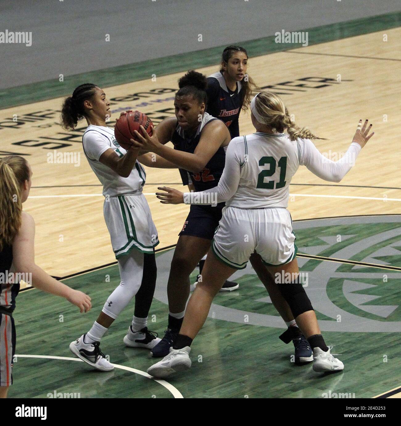 January 22, 2021 - CSU Fullerton Titans center Ashlee Lewis #32 fights ...