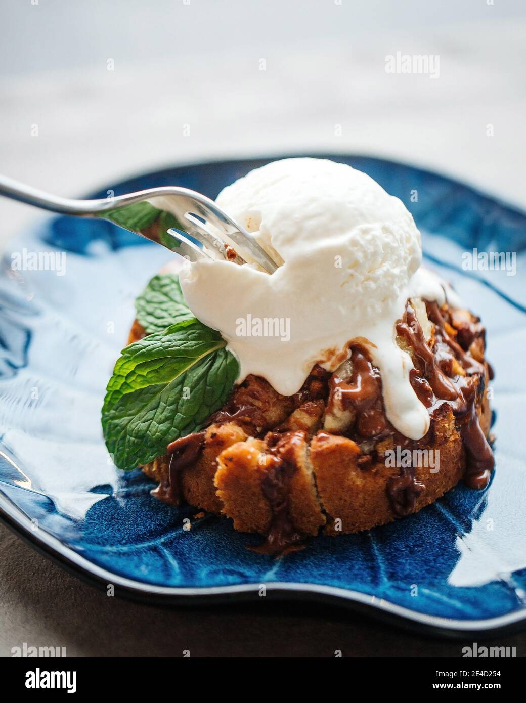 Eating italian pie with ice cream and chocolate Stock Photo - Alamy