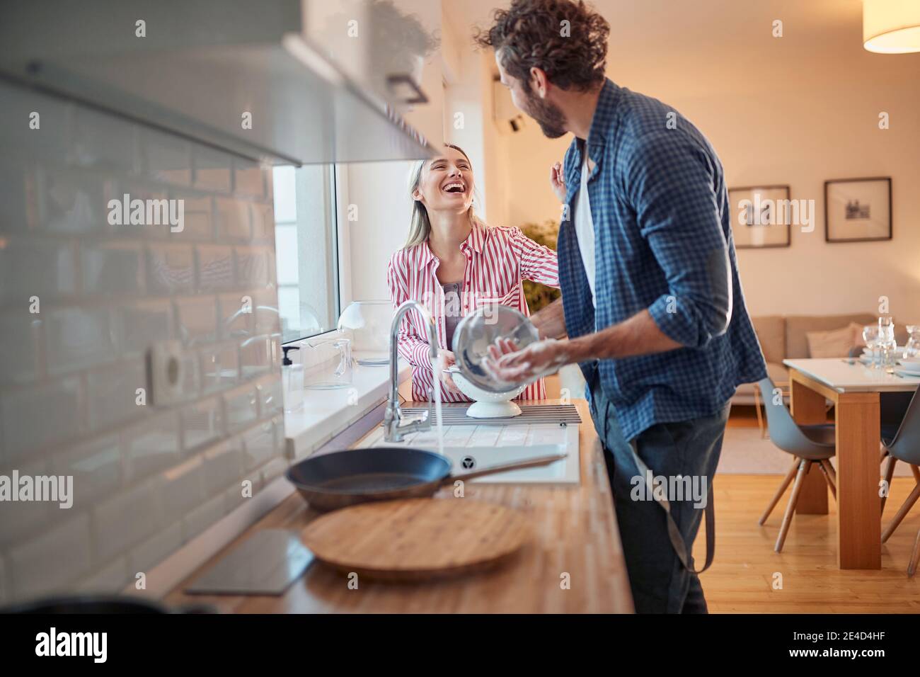 Family doing dishes in hi-res stock photography and images - Alamy
