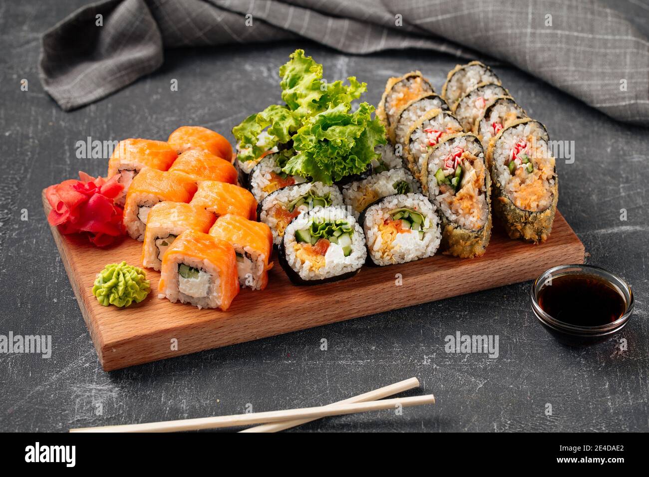 Side view sushi roll assorted set with soy sauce Stock Photo - Alamy