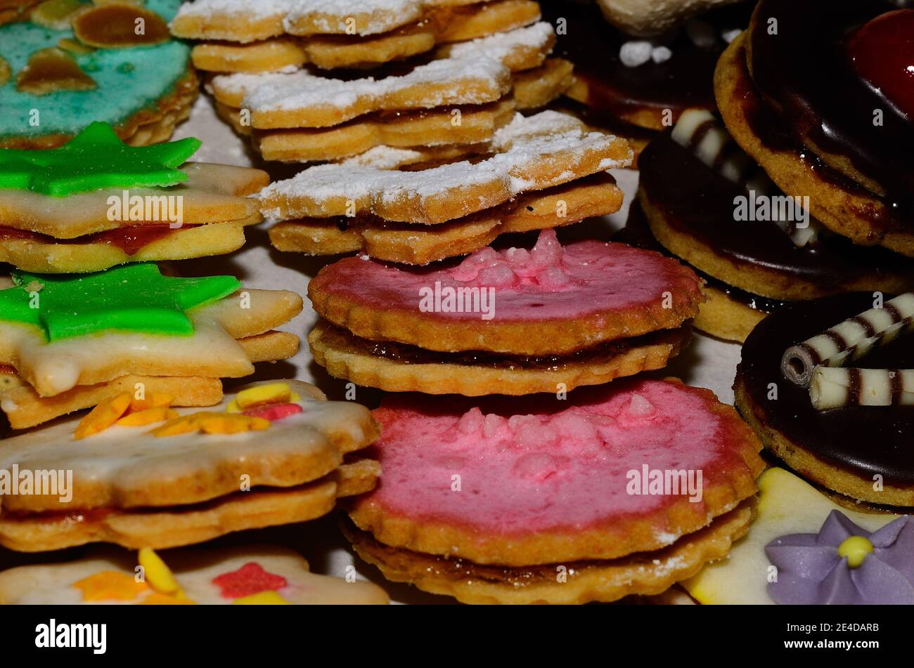 various sweet colorful biscuits for Christmas Stock Photo - Alamy