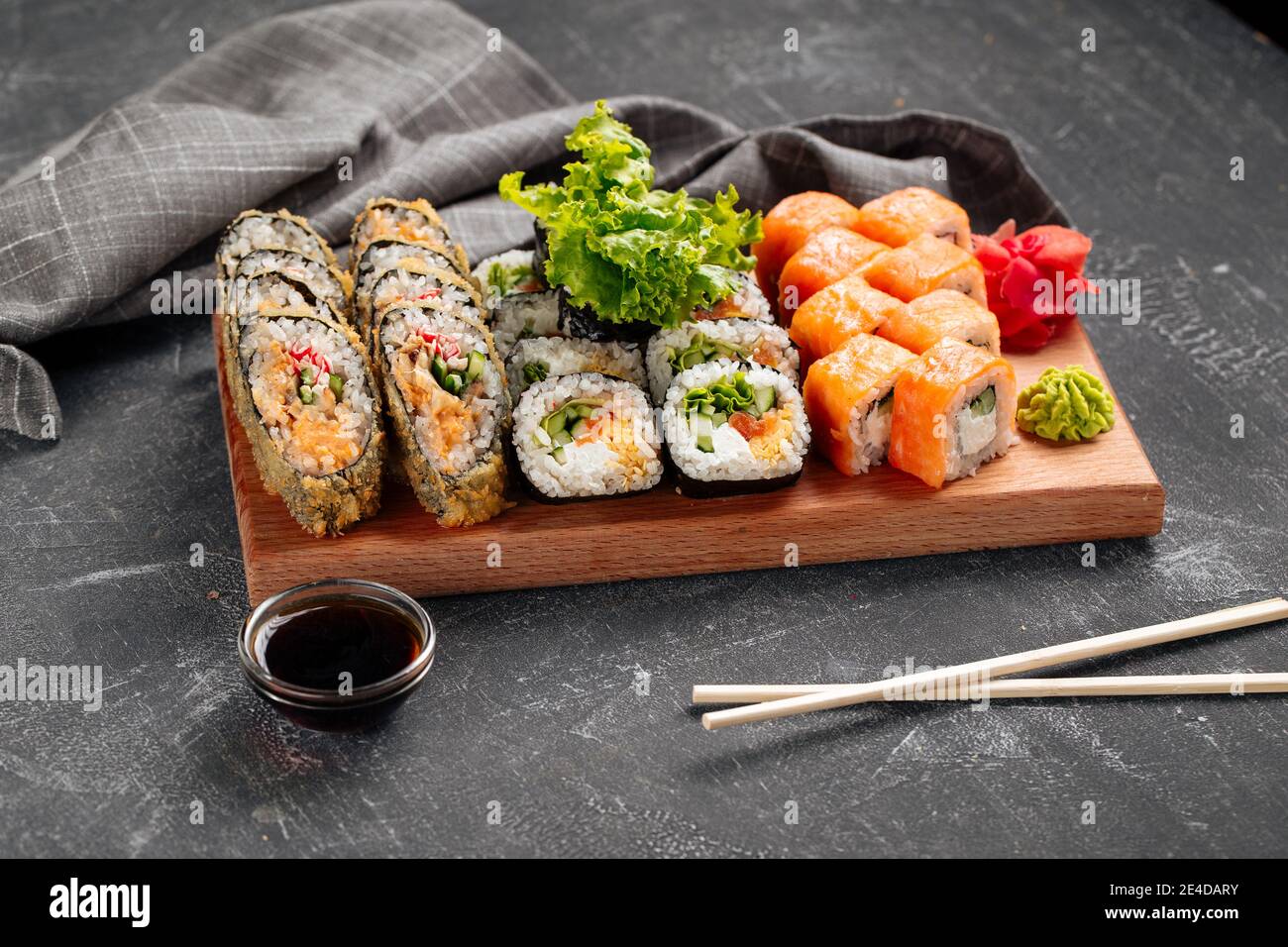 Side view sushi roll assorted set with soy sauce Stock Photo - Alamy