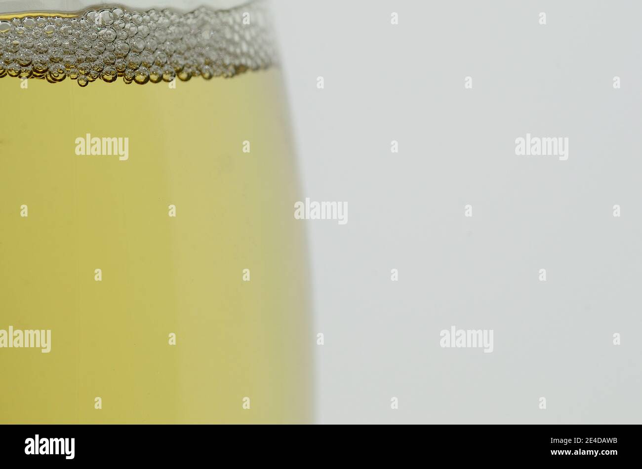 Champagne in glass and many pearls with white background Stock Photo ...