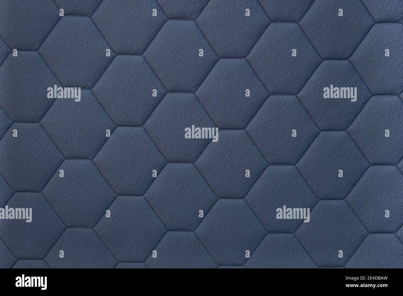 Gray-blue fabric texture with hexagons pattern - close-up of mattress ...