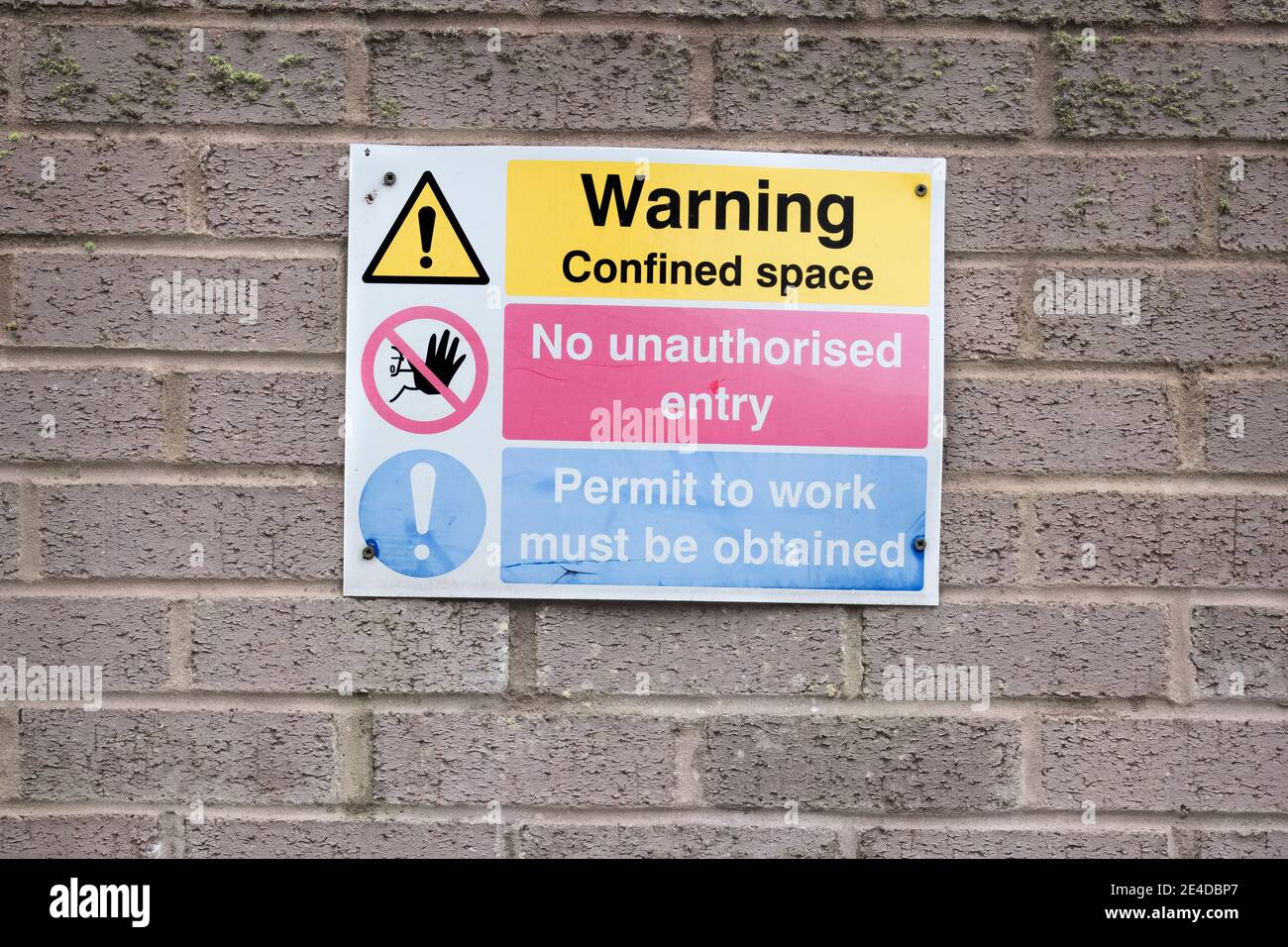 No unauthorised entry confined space warning sign Stock Photo - Alamy