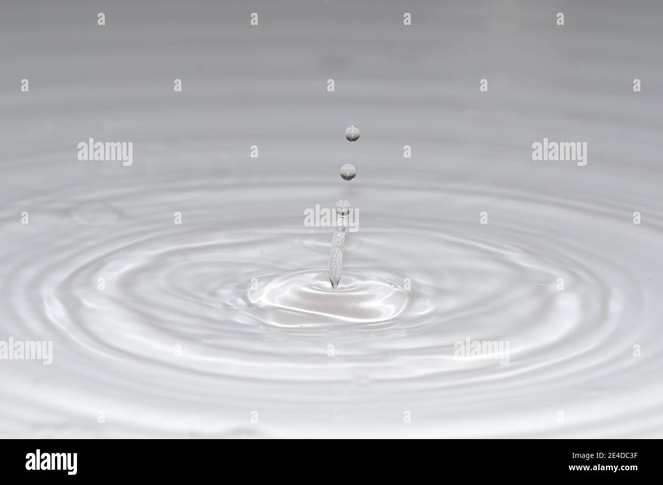 three drops in fresh clear water Stock Photo - Alamy