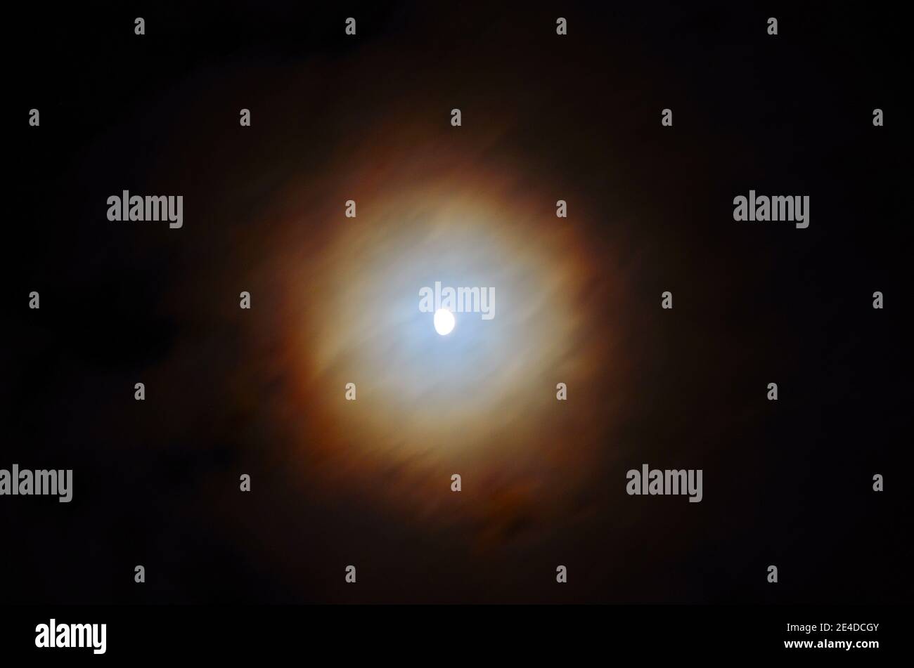 Moon and bright colorful sparkle at night Stock Photo - Alamy