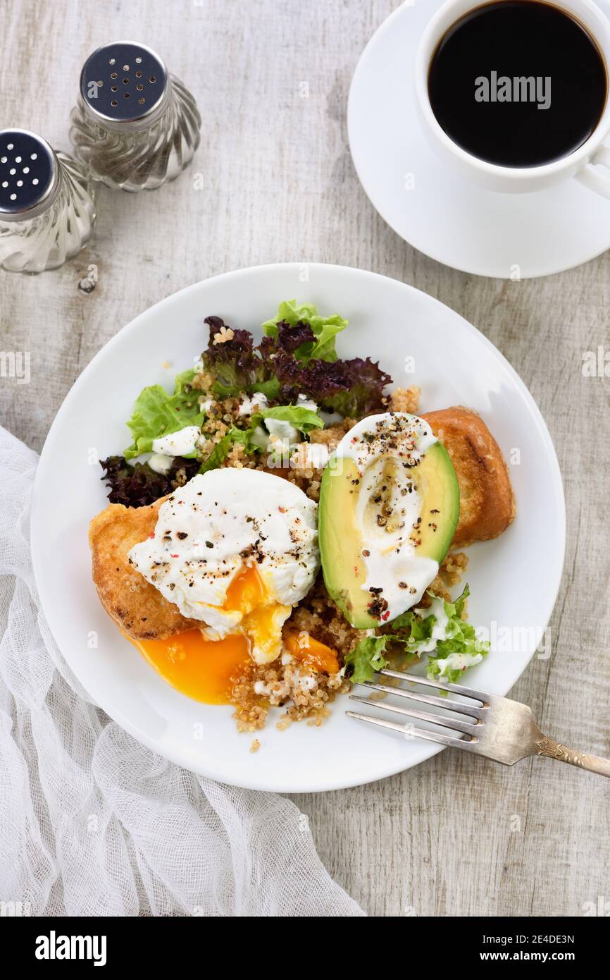 A healthy and balanced breakfast plate. Benedict's egg spreads on a ...