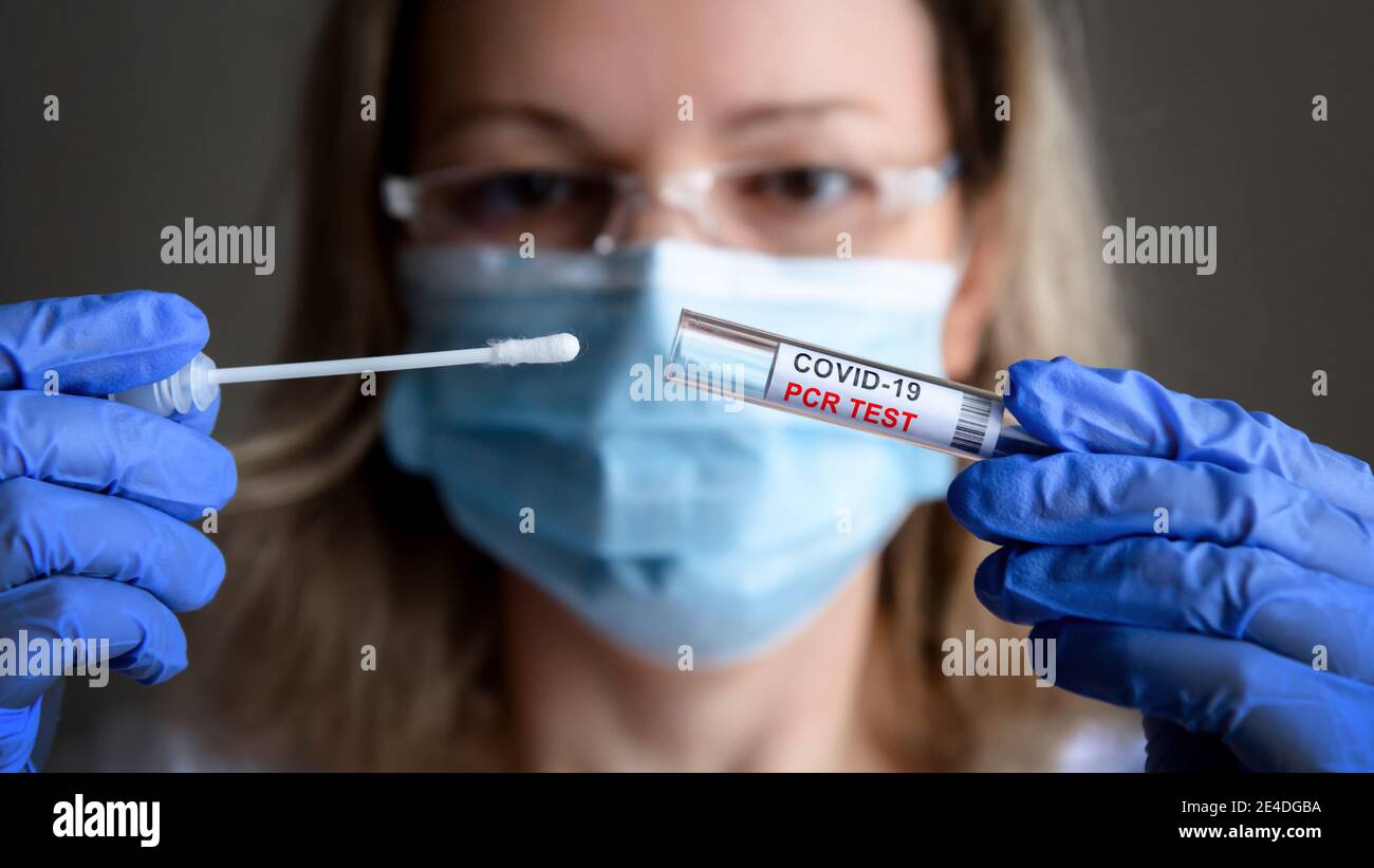 Coronavirus swab collection kit in doctor hands, woman in medical mask ...