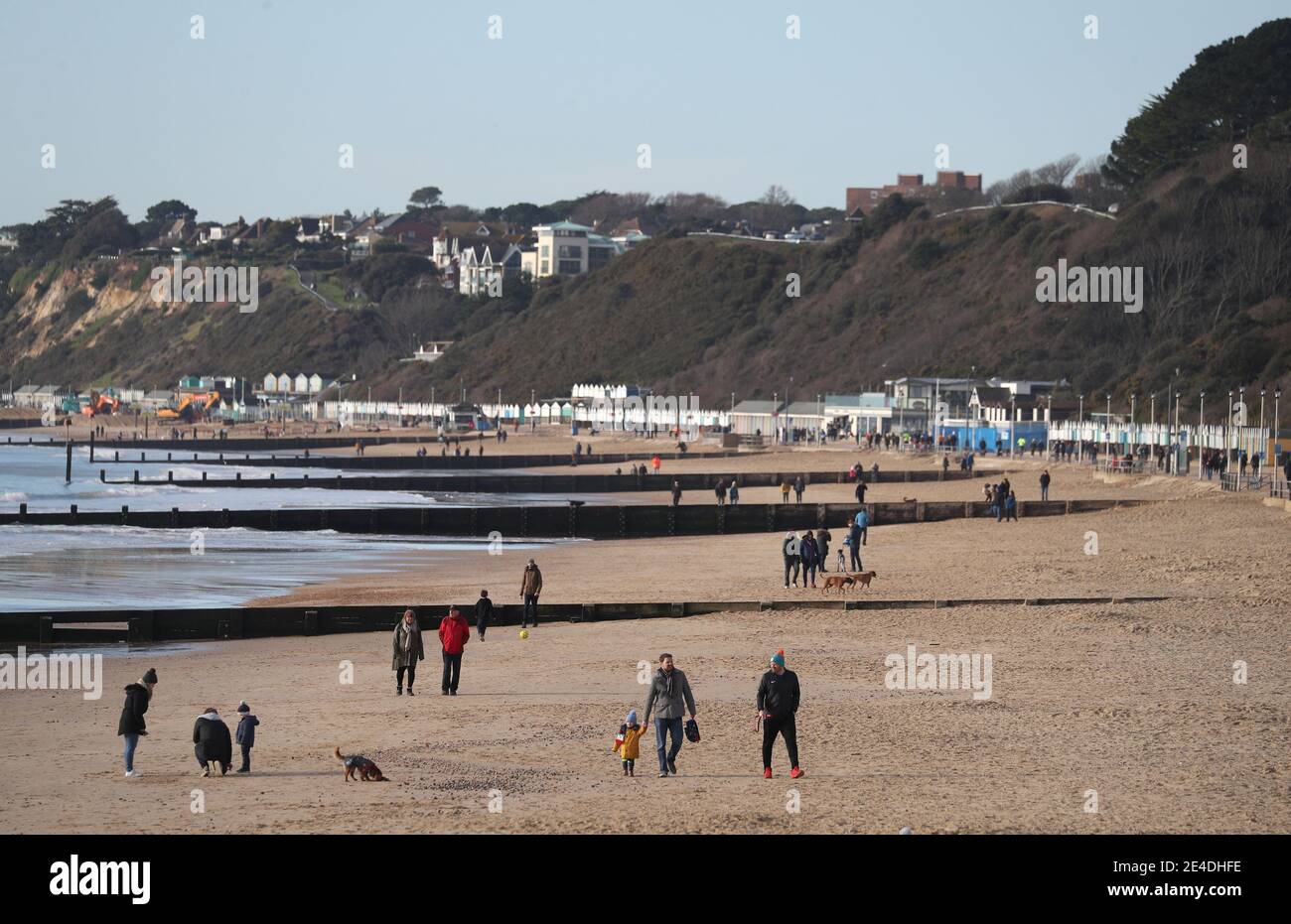People walking along Bournemouth beach in Dorset. Picture date ...
