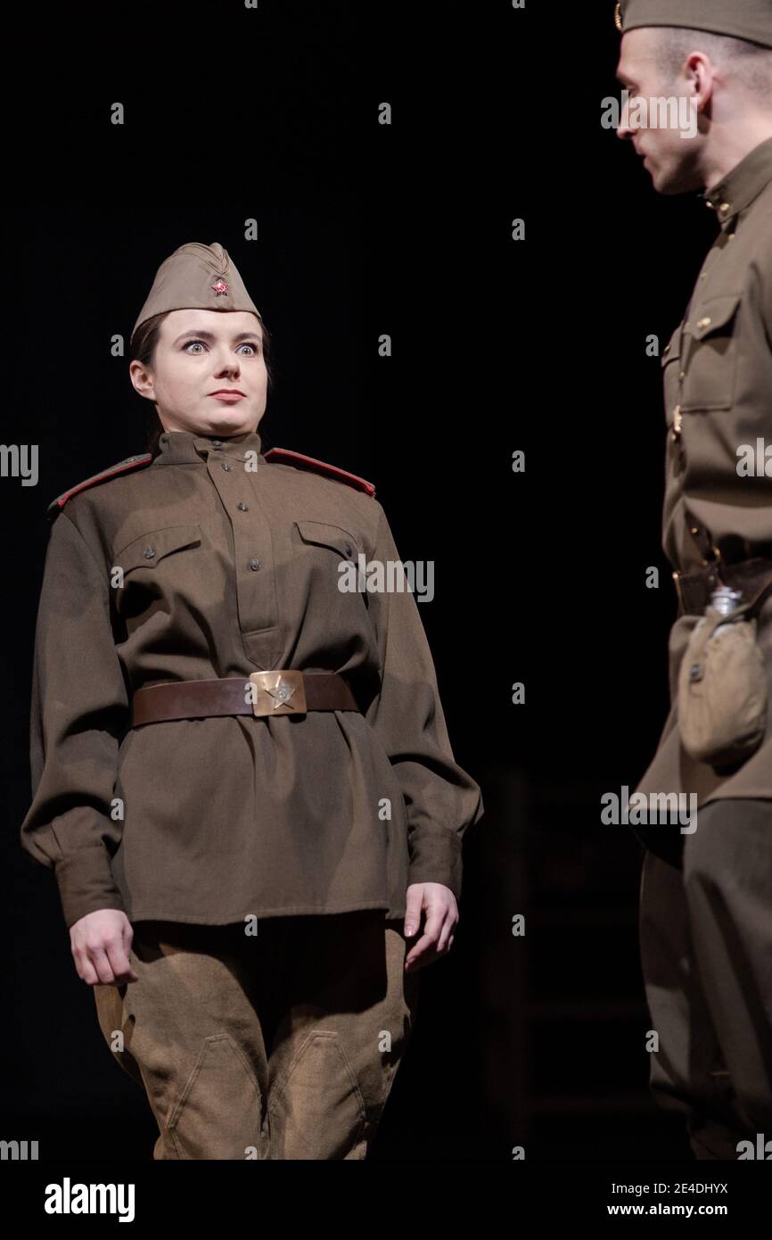 Actors in military uniforms of the Soviet army of World War II play a ...