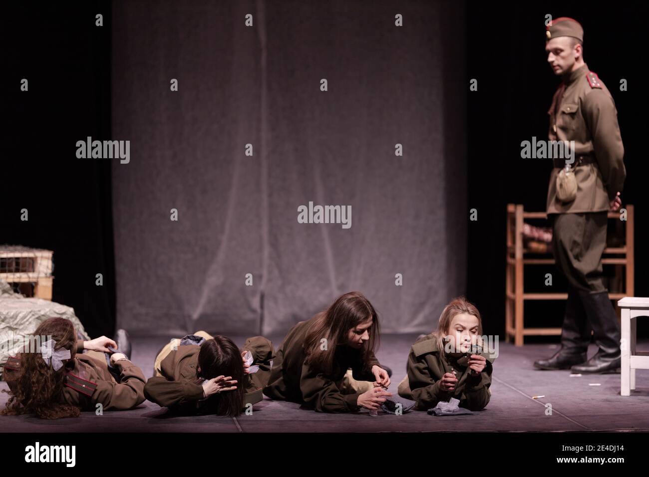 Actors in military uniforms of the Soviet army of World War II play a ...