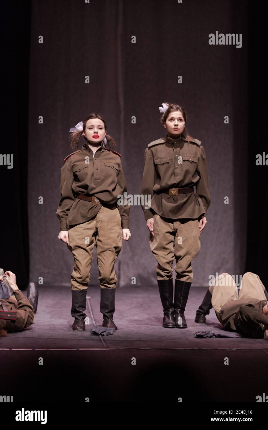 Actors in military uniforms of the Soviet army of World War II play a ...