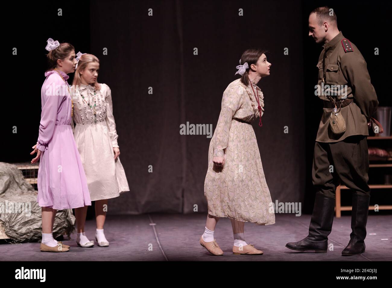 Actors in military uniforms of the Soviet army of World War II play a ...