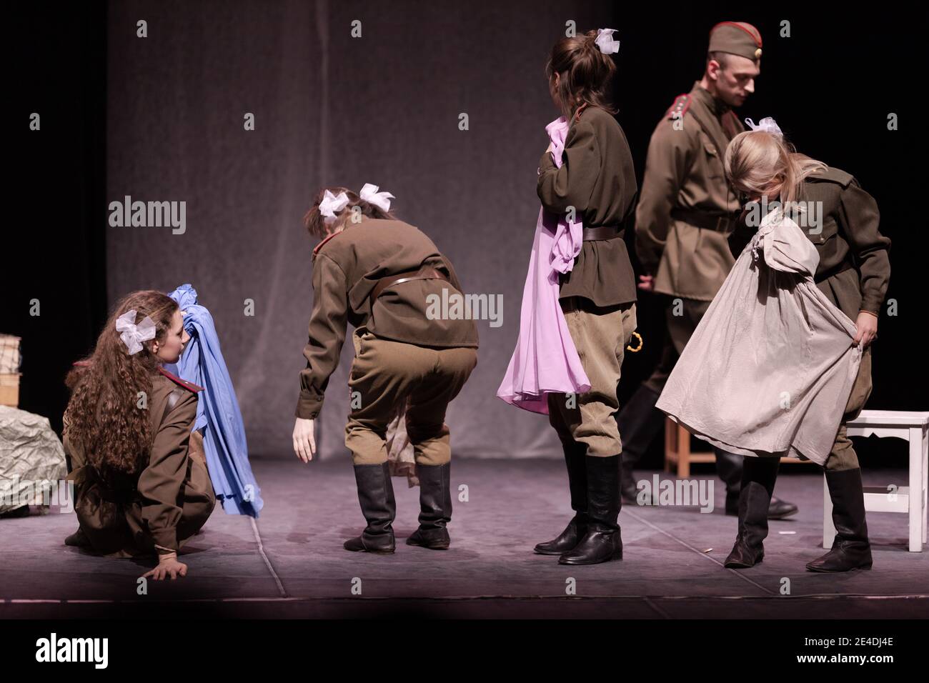 Actors in military uniforms of the Soviet army of World War II play a ...