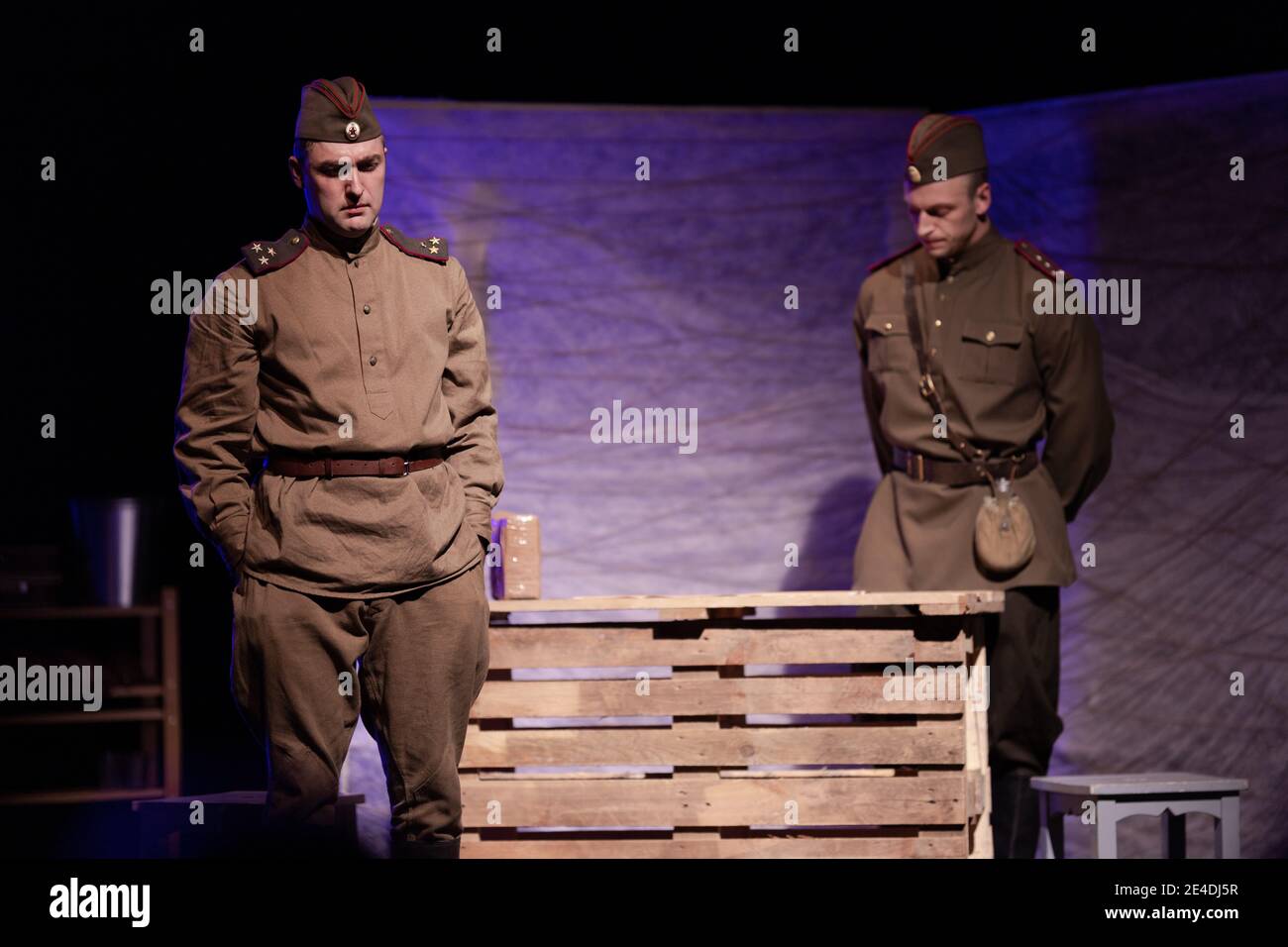 Actors in military uniforms of the Soviet army of World War II play a ...