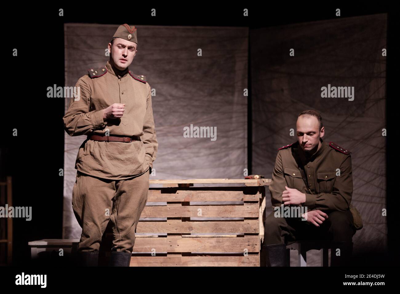 Actors in military uniforms of the Soviet army of World War II play a ...