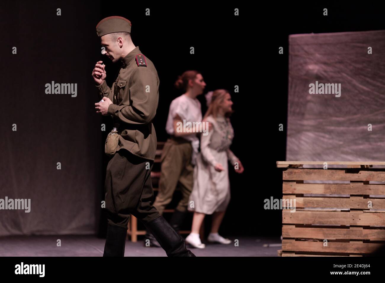 Actors in military uniforms of the Soviet army of World War II play a ...