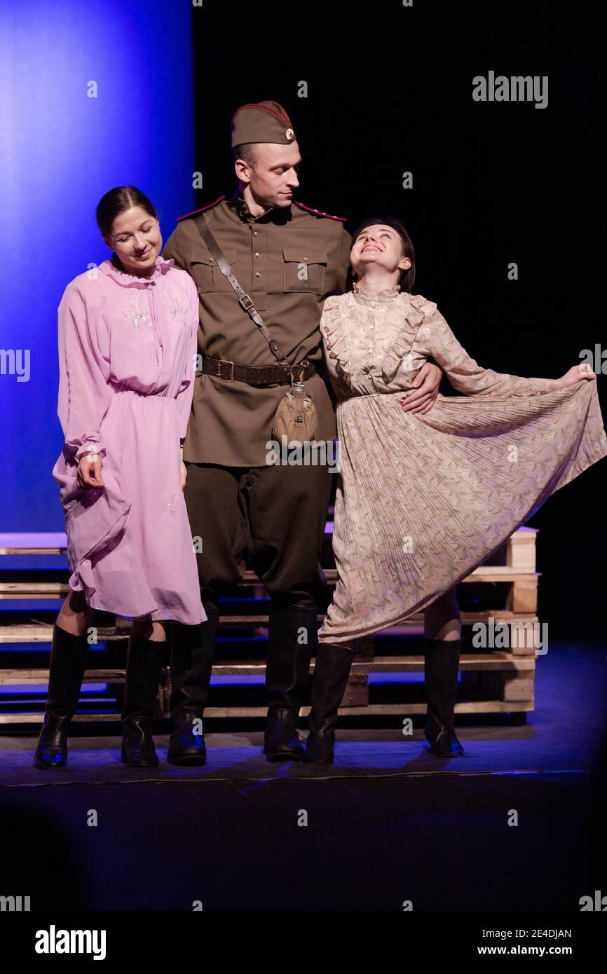 Actors in military uniforms of the Soviet army of World War II play a ...