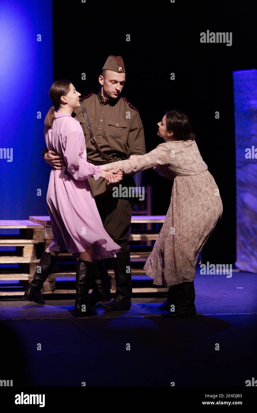 Actors in military uniforms of the Soviet army of World War II play a ...