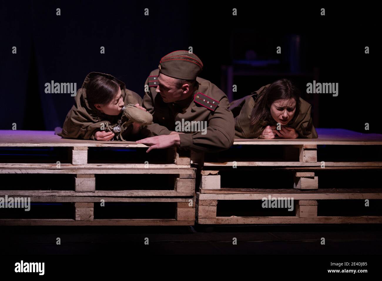 Actors in military uniforms of the Soviet army of World War II play a ...