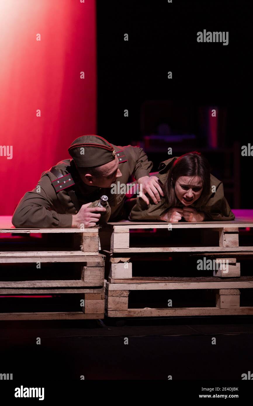 Actors in military uniforms of the Soviet army of World War II play a ...
