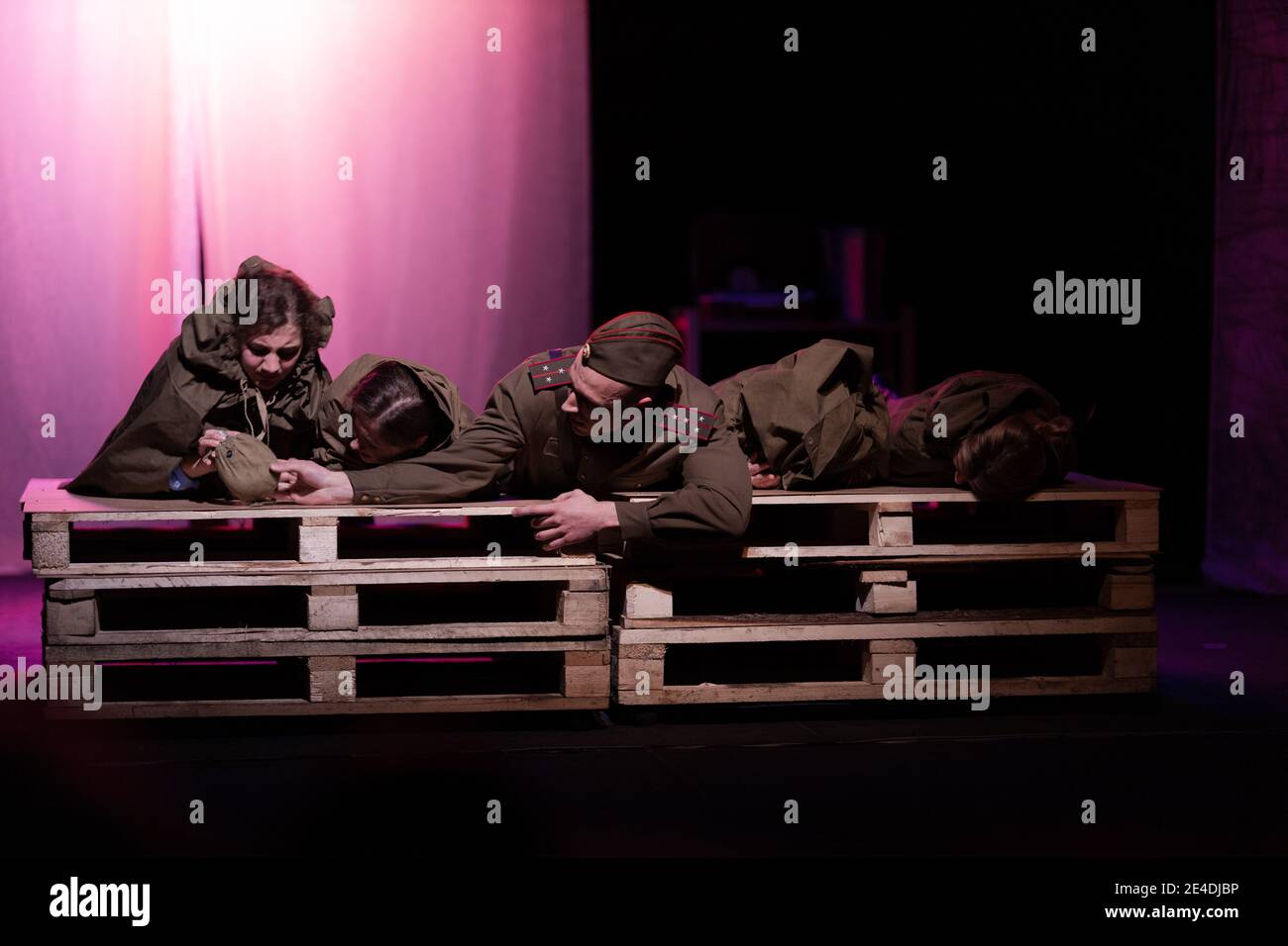 Actors in military uniforms of the Soviet army of World War II play a ...