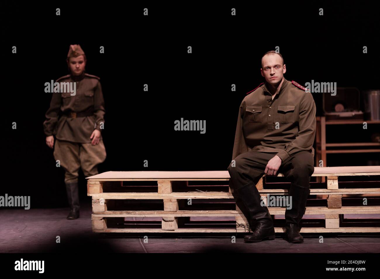 Actors in military uniforms of the Soviet army of World War II play a ...