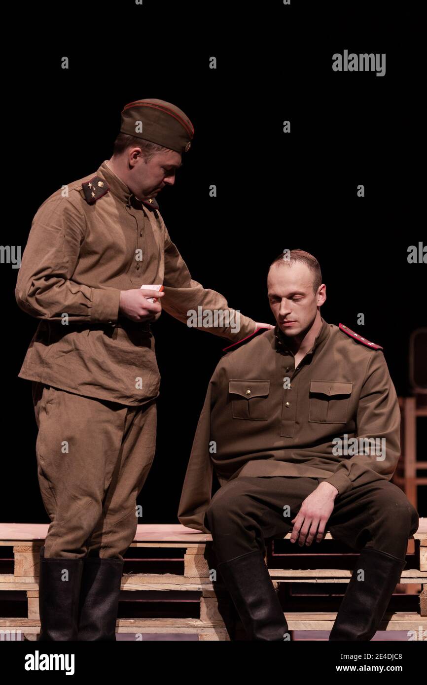 Actors in military uniforms of the Soviet army of World War II play a ...