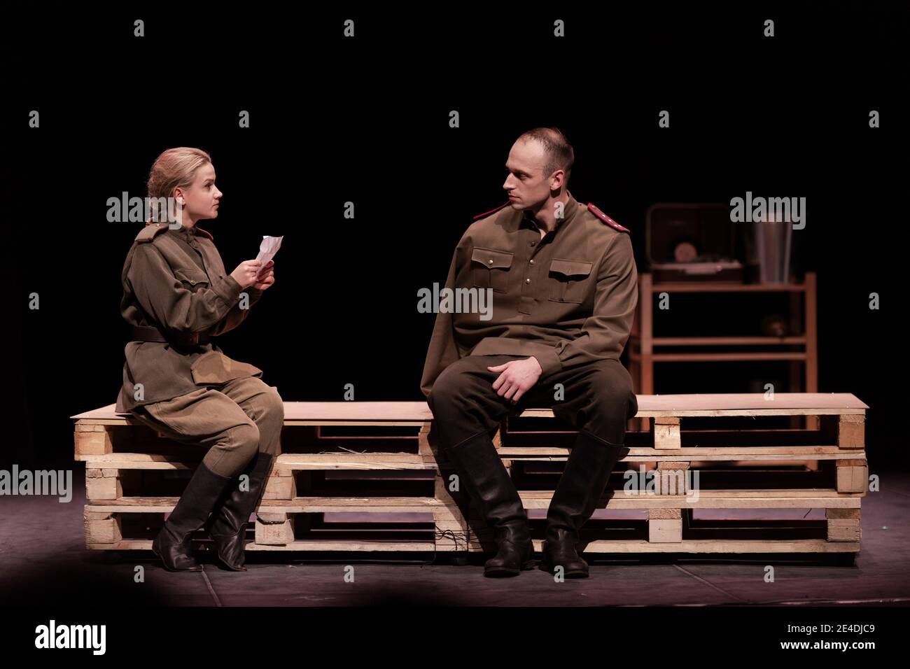 Actors in military uniforms of the Soviet army of World War II play a ...