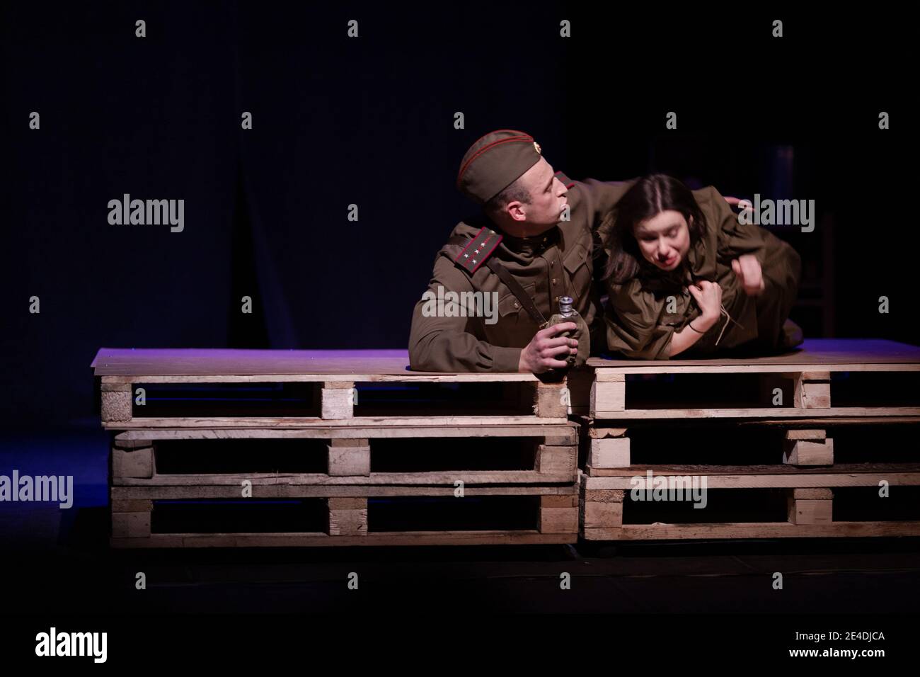 Actors in military uniforms of the Soviet army of World War II play a ...