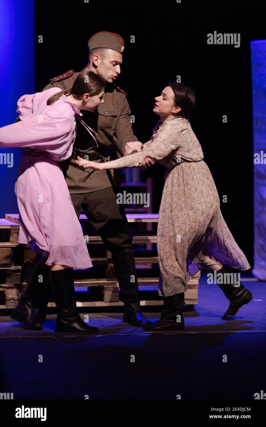 Actors in military uniforms of the Soviet army of World War II play a ...