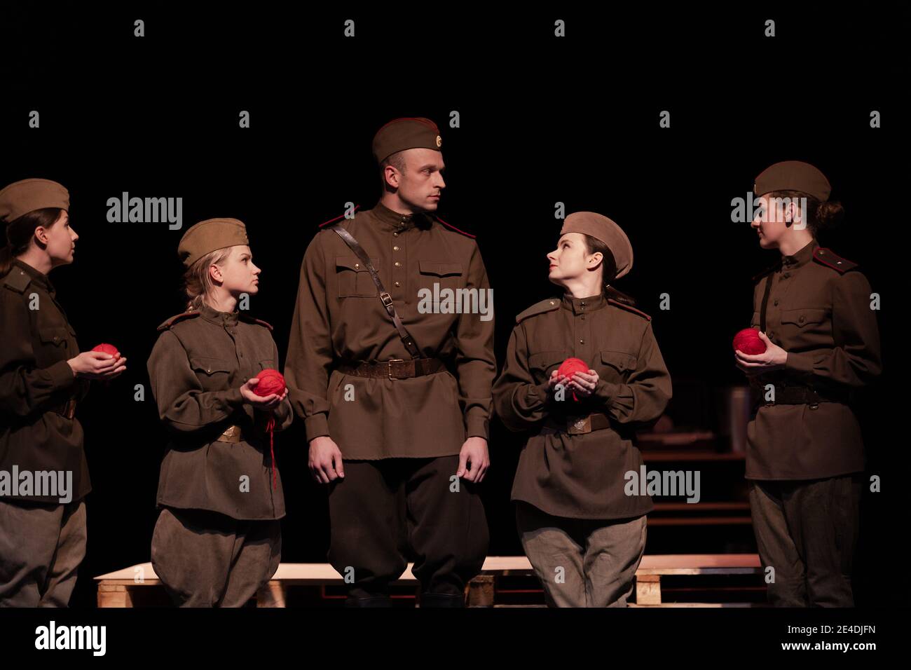 Actors in military uniforms of the Soviet army of World War II play a ...
